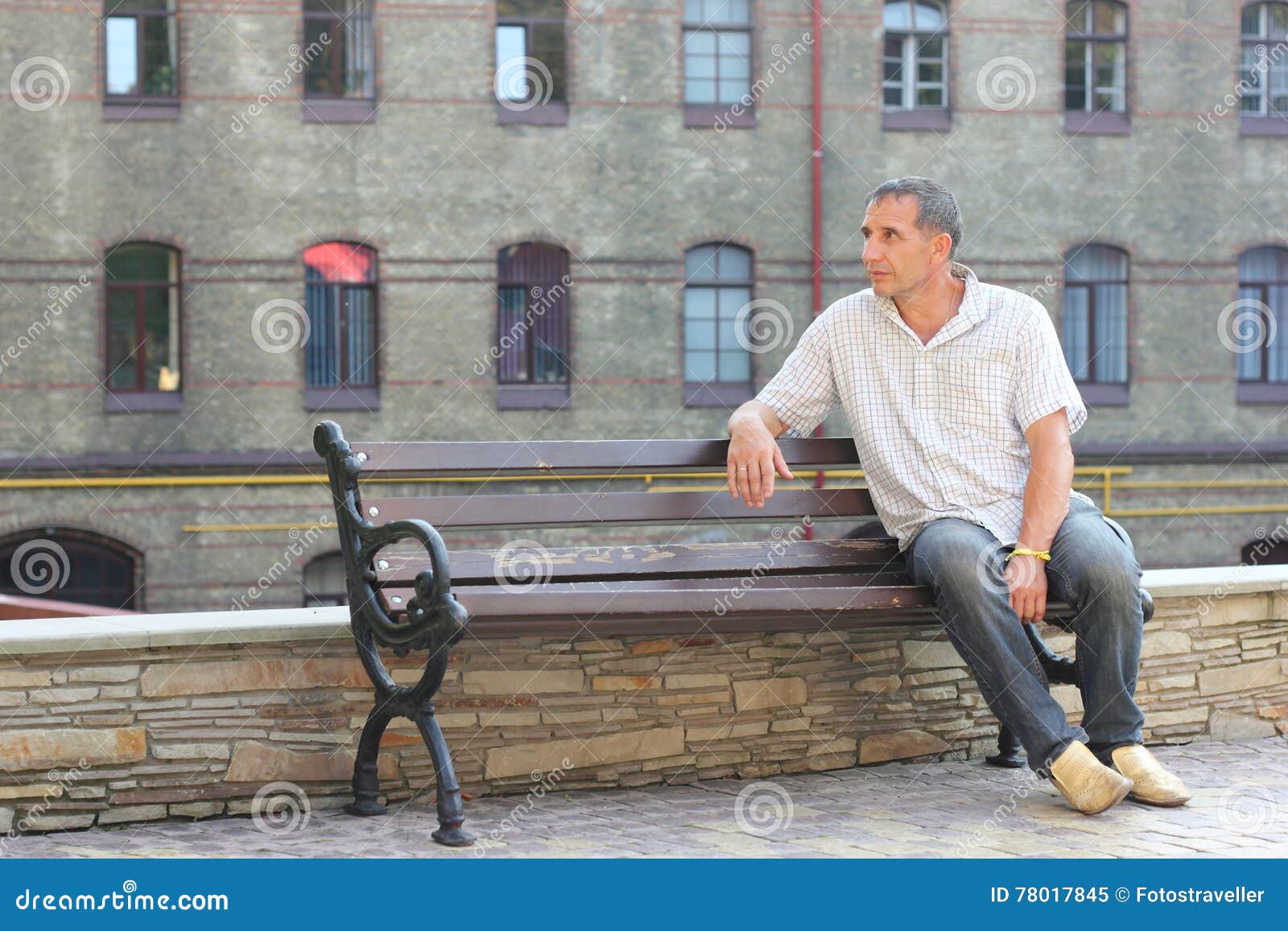 Man on the bench waiting stock image. Image of middle - 78017845