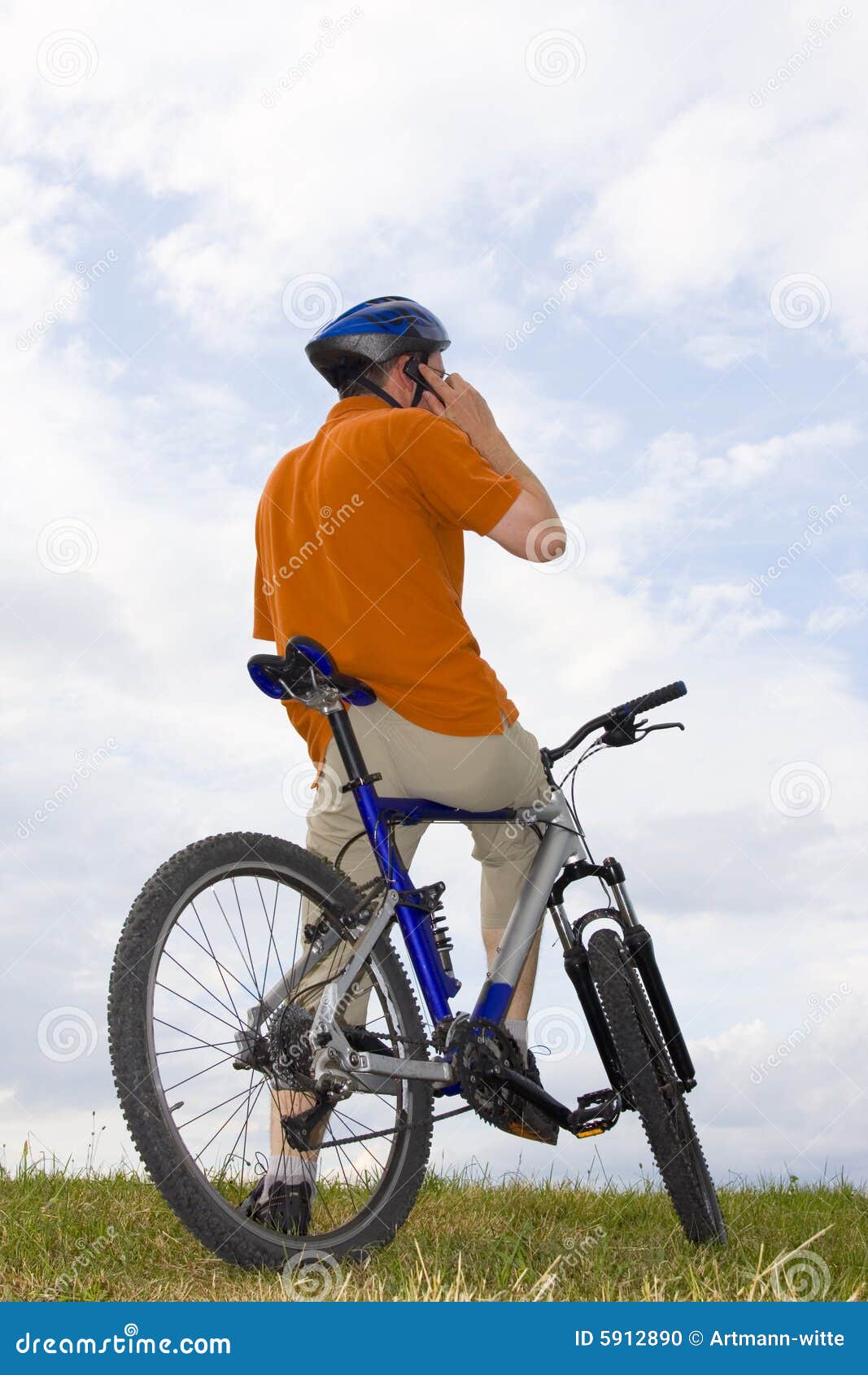 Man with Bicycle Making a Phone Call Stock Photo - Image of helmet ...