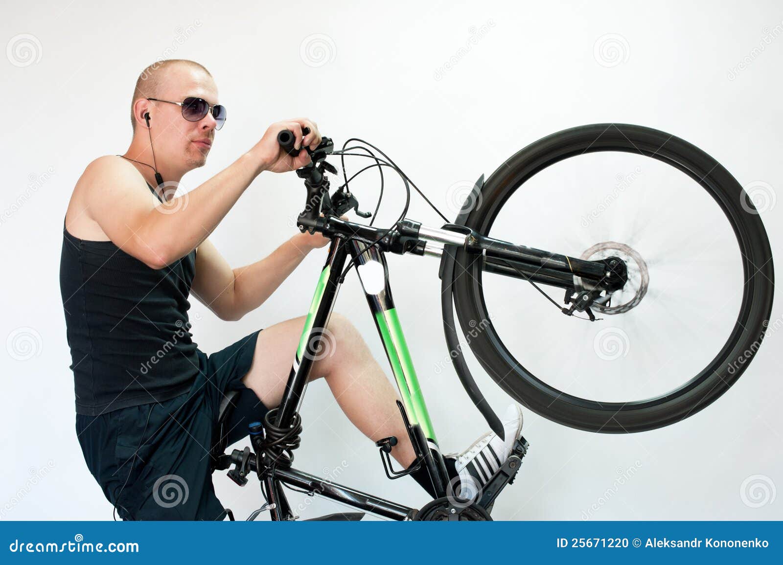 A Man with a Bicycle in Motion Stock Photo - Image of wheel ...
