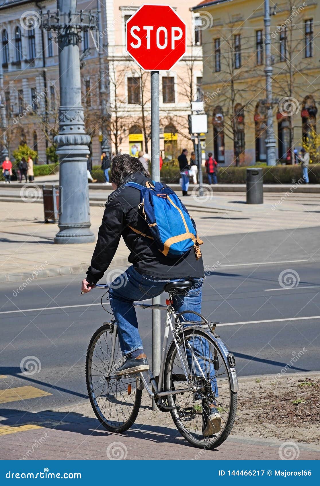 Man with Bicycle at the Stop Sign in the City Stock Image - Image of ...