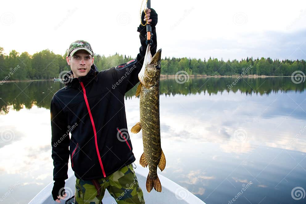 Man with big pike stock photo. Image of water, catch, sport - 9490776