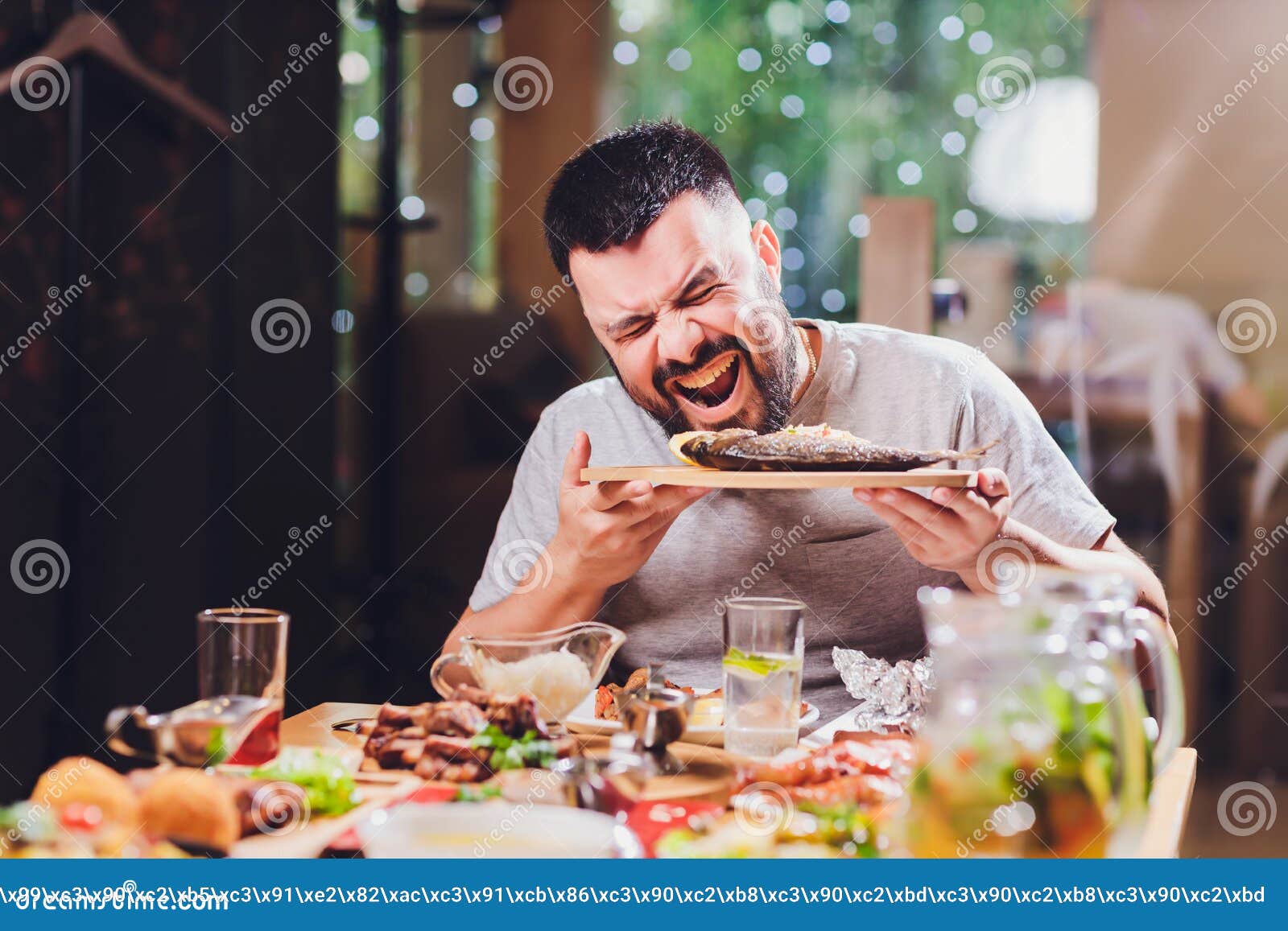Man at the Big Table with Food. Stock Image - Image of family, face ...