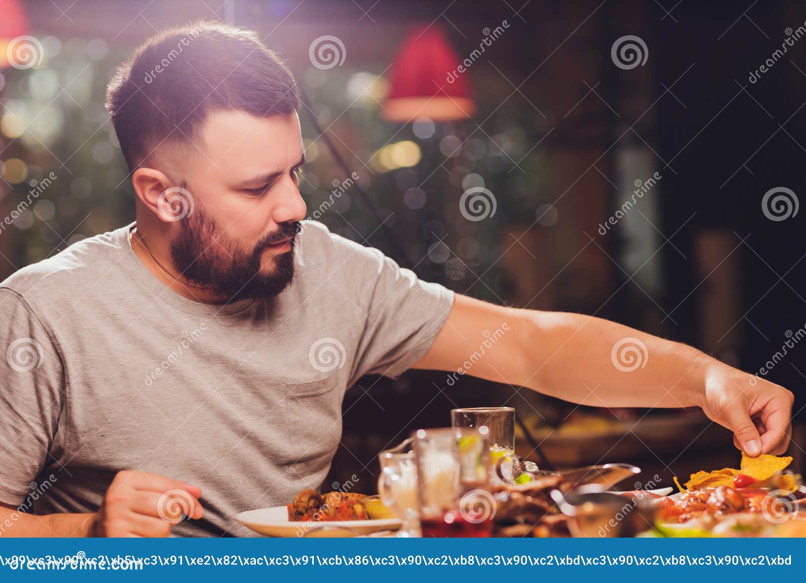Man at the Big Table with Food. Stock Image - Image of holiday, fork ...