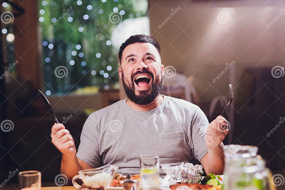 Man at the Big Table with Food. Stock Photo - Image of person, party ...