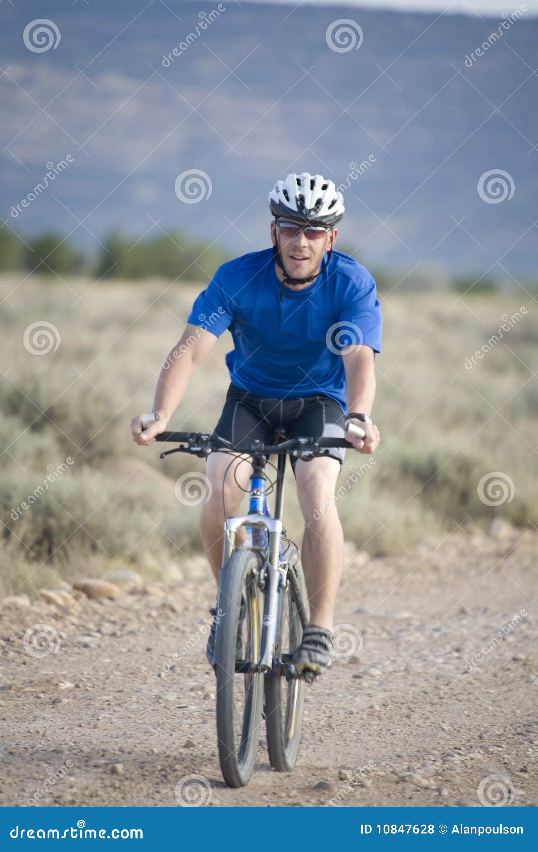 Man on bike front viewf stock photo. Image of exercise - 10847628