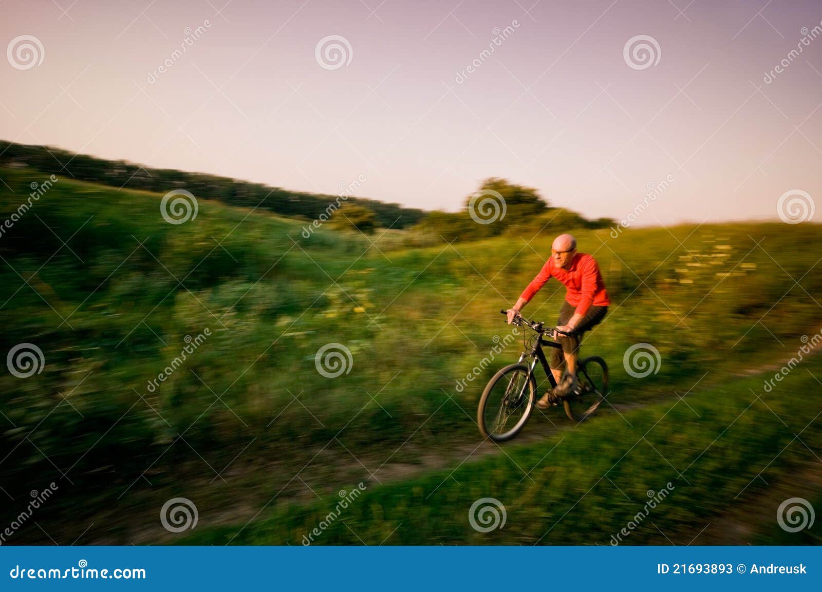 Man biking in motion stock image. Image of sport, exercise - 21693893