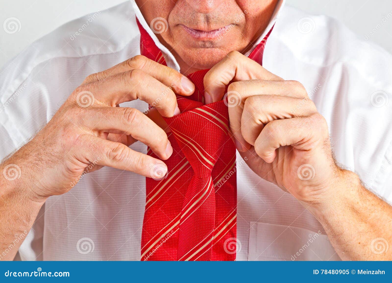 Man binding his tie stock image. Image of isolated, correct - 78480905