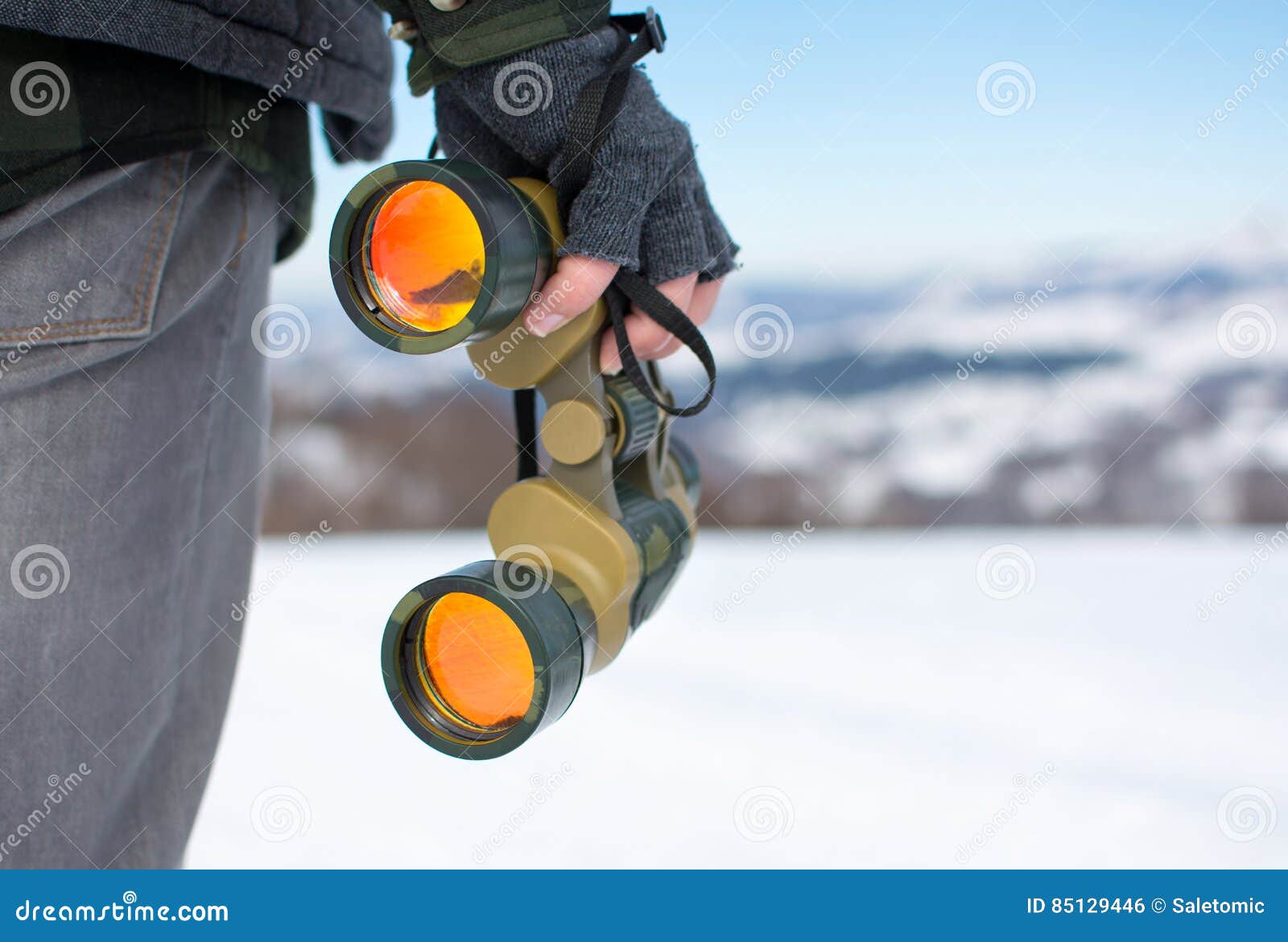 Man with Binoculars Exploring Snowy Mountain Stock Photo - Image of ...