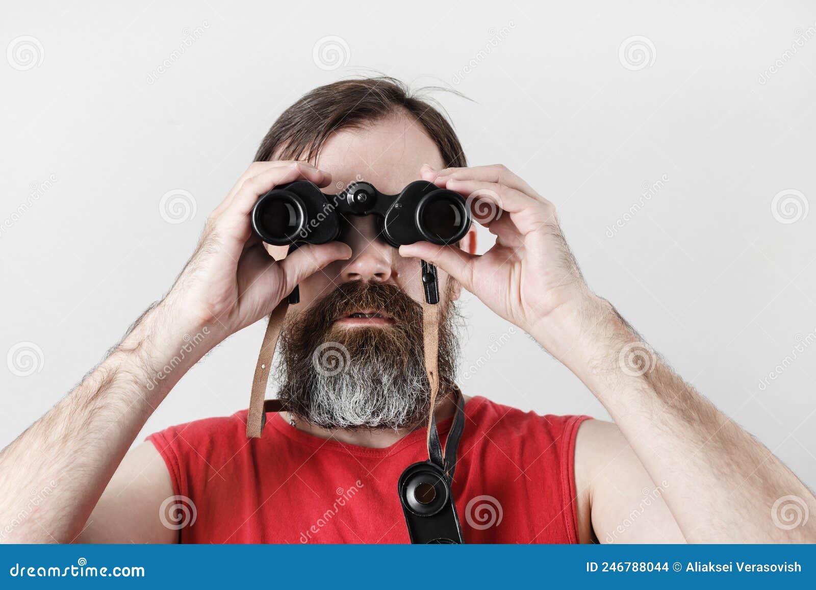 Man with binoculars stock photo. Image of exploration - 246788044