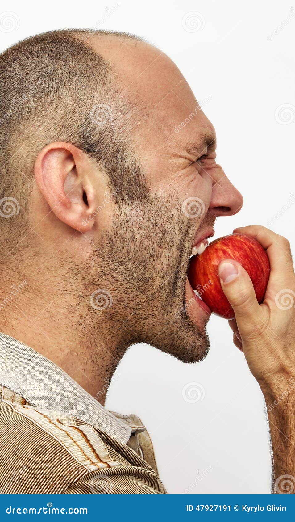 Man bites red apple stock image. Image of teeth, hungry - 47927191