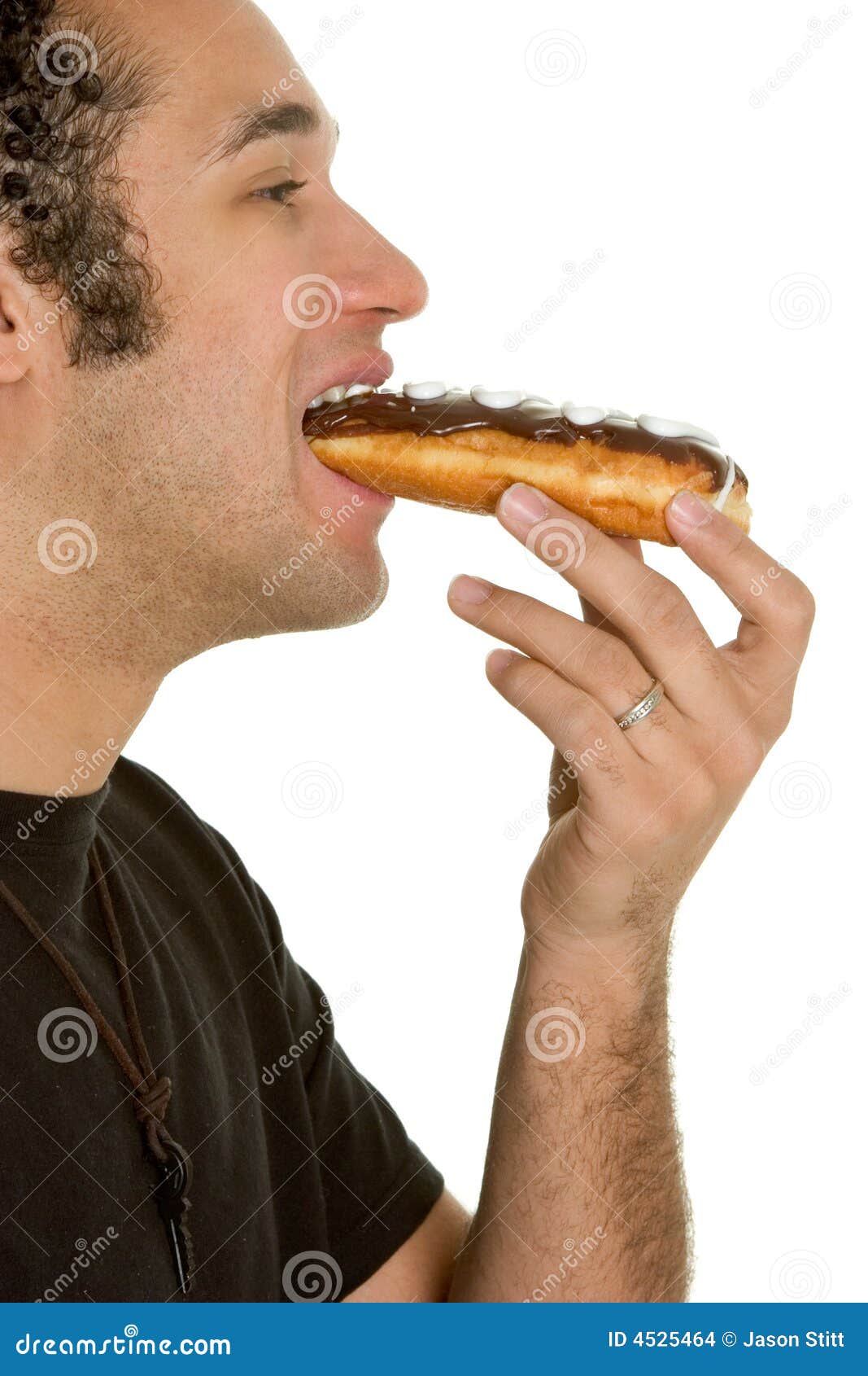 Man Biting Chocolate Donut stock photo. Image of bite - 4525464