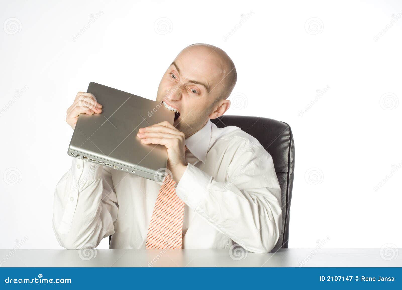 Man Biting Laptop stock image. Image of emotion, biting - 2107147