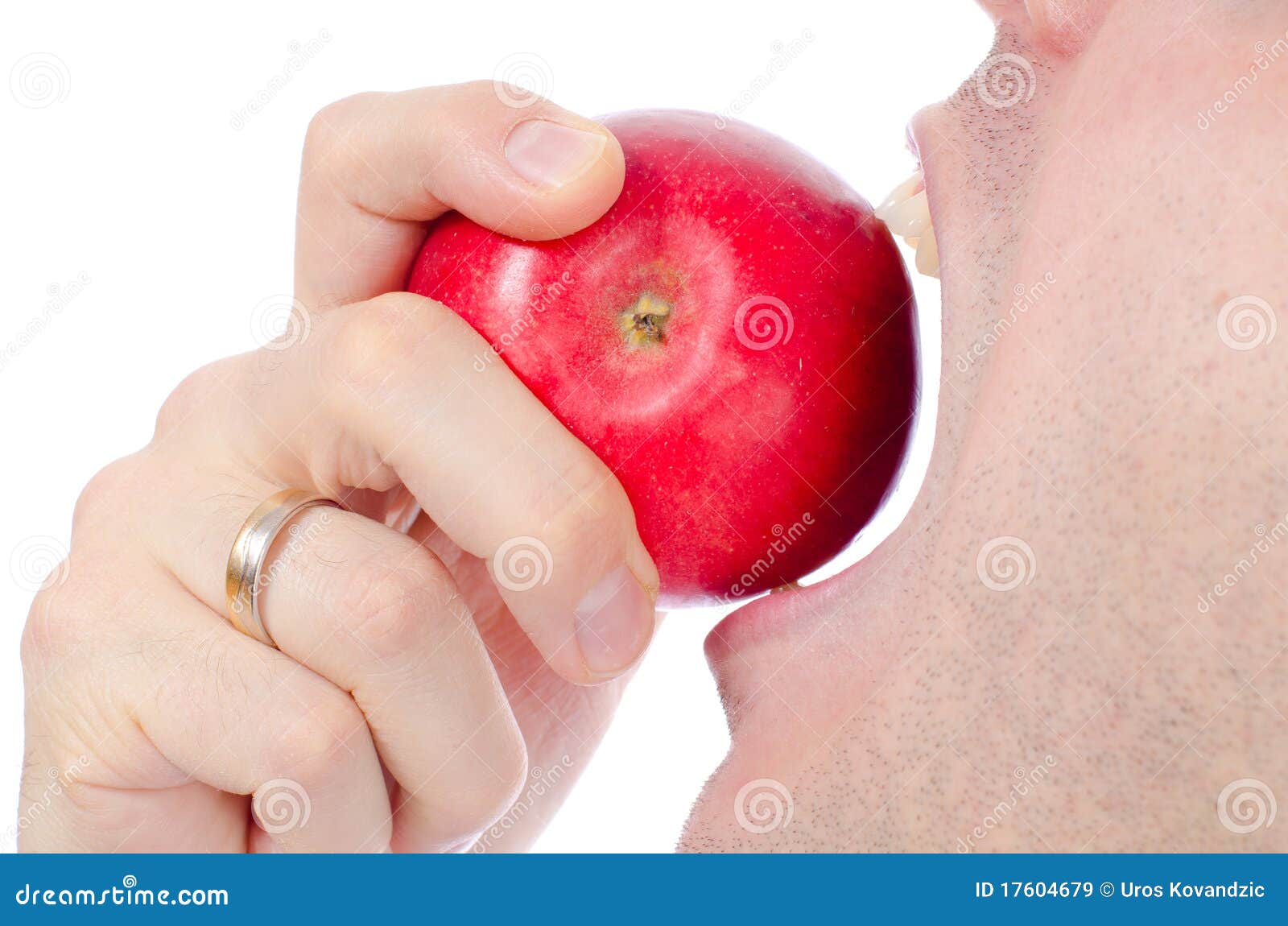 Man Biting red apple stock image. Image of nutrition - 17604679