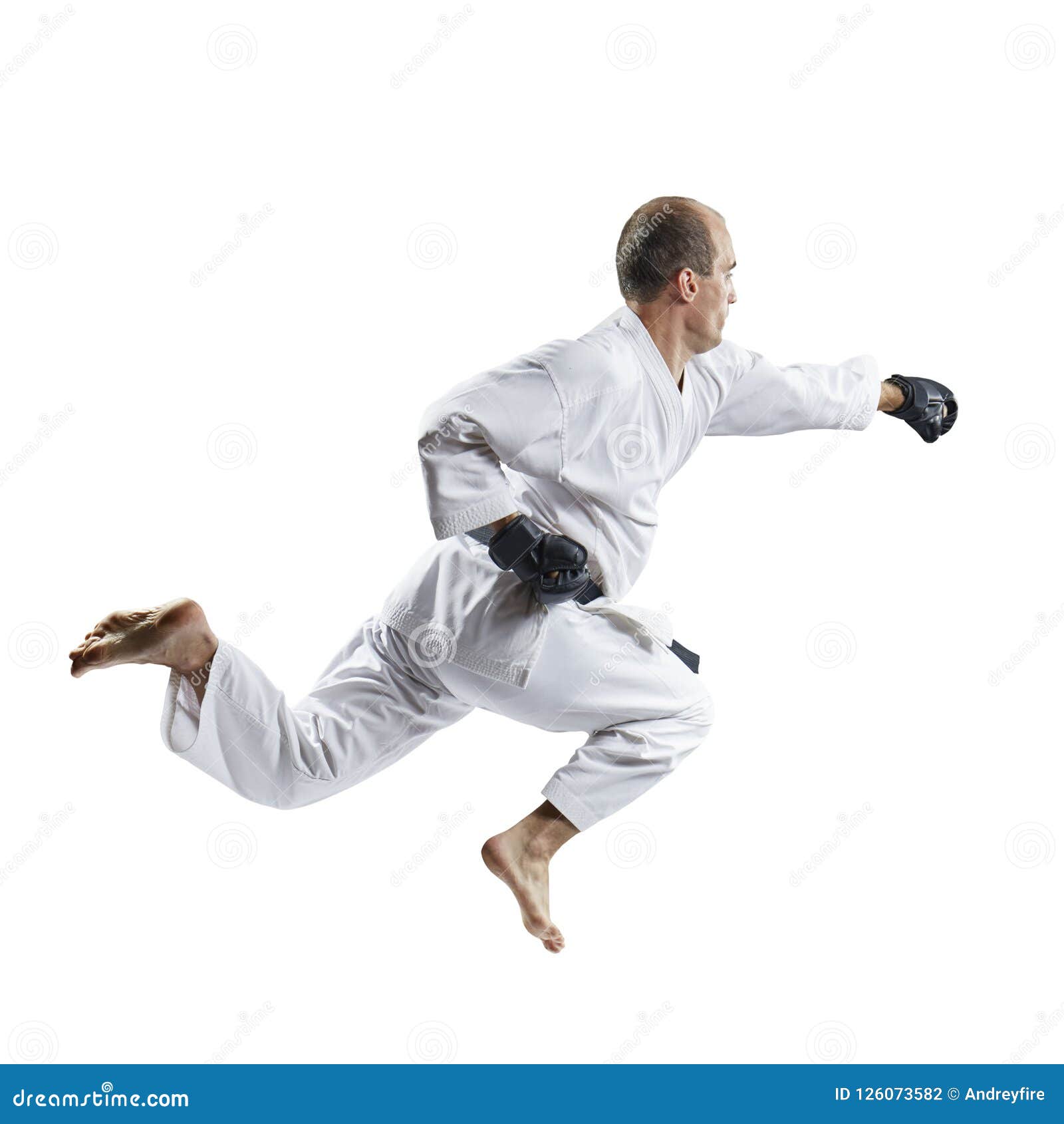 A Man in Black Gloves Beats with a Hand in a Jump Isolated Stock Photo ...