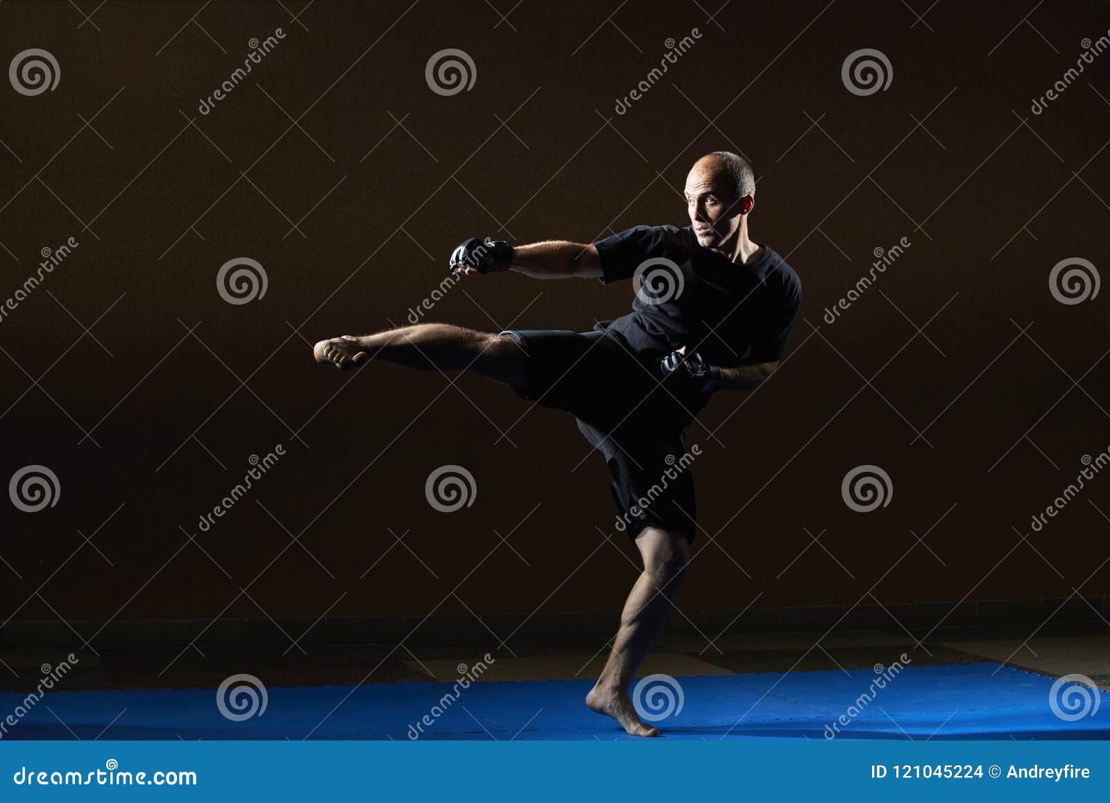 A Man in Black Gloves Beats His Kick To the Side Stock Photo - Image of ...