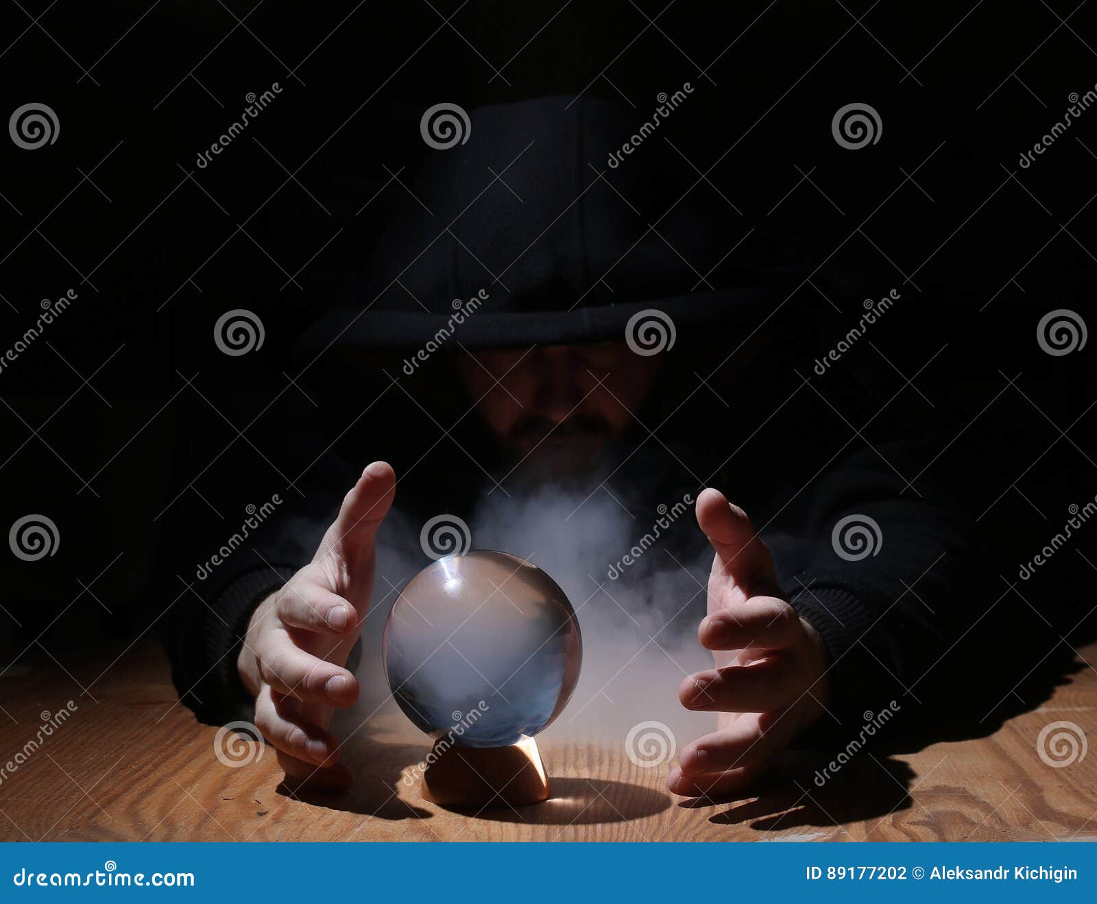 Man in a Black Hood with Cristal Ball Stock Photo - Image of dark ...