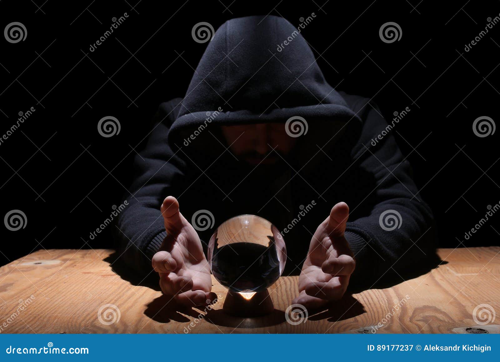 Man in a Black Hood with Cristal Ball Stock Image - Image of fortune ...