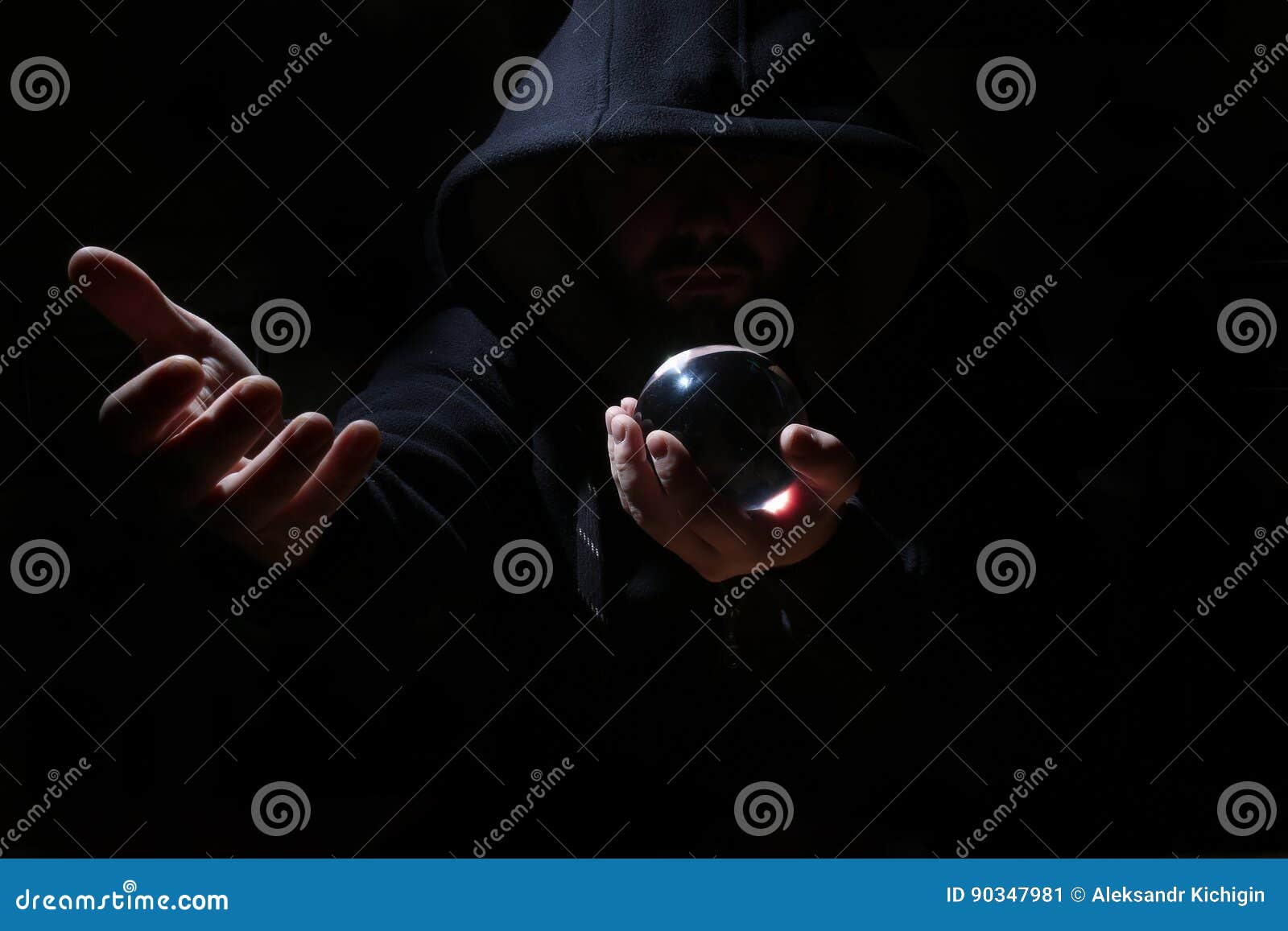 Man in a Black Hood with Cristal Ball Stock Image - Image of omen ...