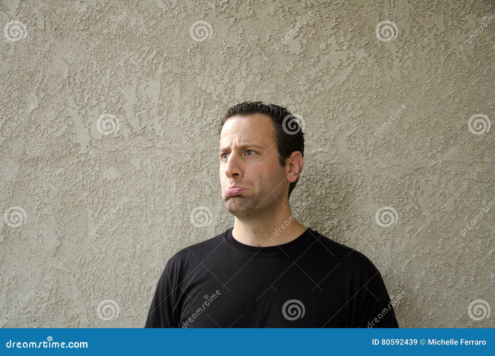 Man in a Black T-shirt with a Sad Expression. Stock Image - Image of ...