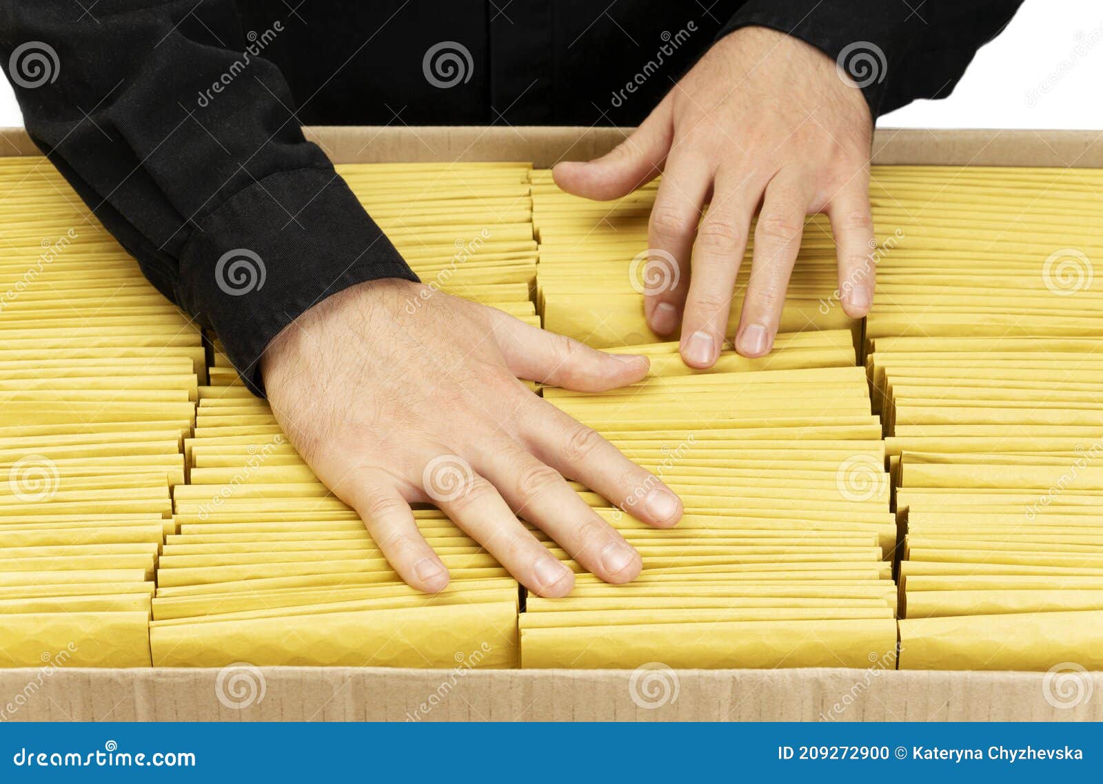 Man in Black Uniform Counting Envelopes in a Box Stock Photo - Image of ...