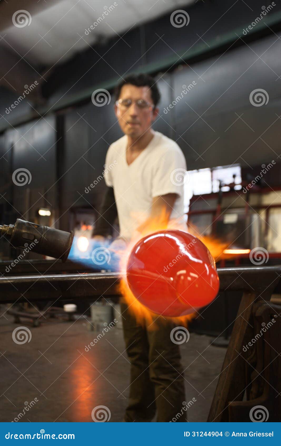 Man Blasting Glass with Flames Stock Photo - Image of blue, artisan ...