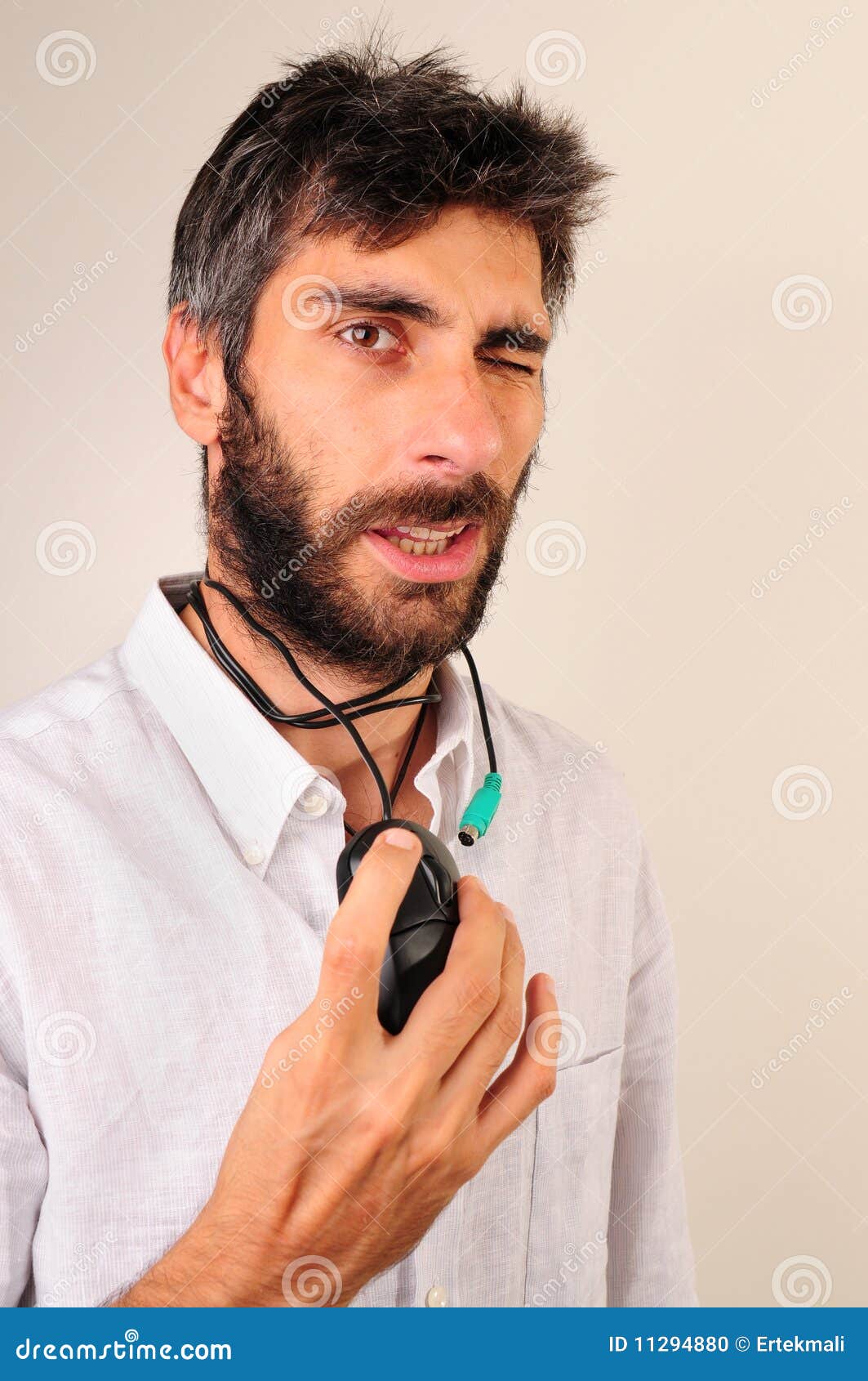 Man Blinking His Eyes and Playing with Mouse Stock Photo - Image of ...
