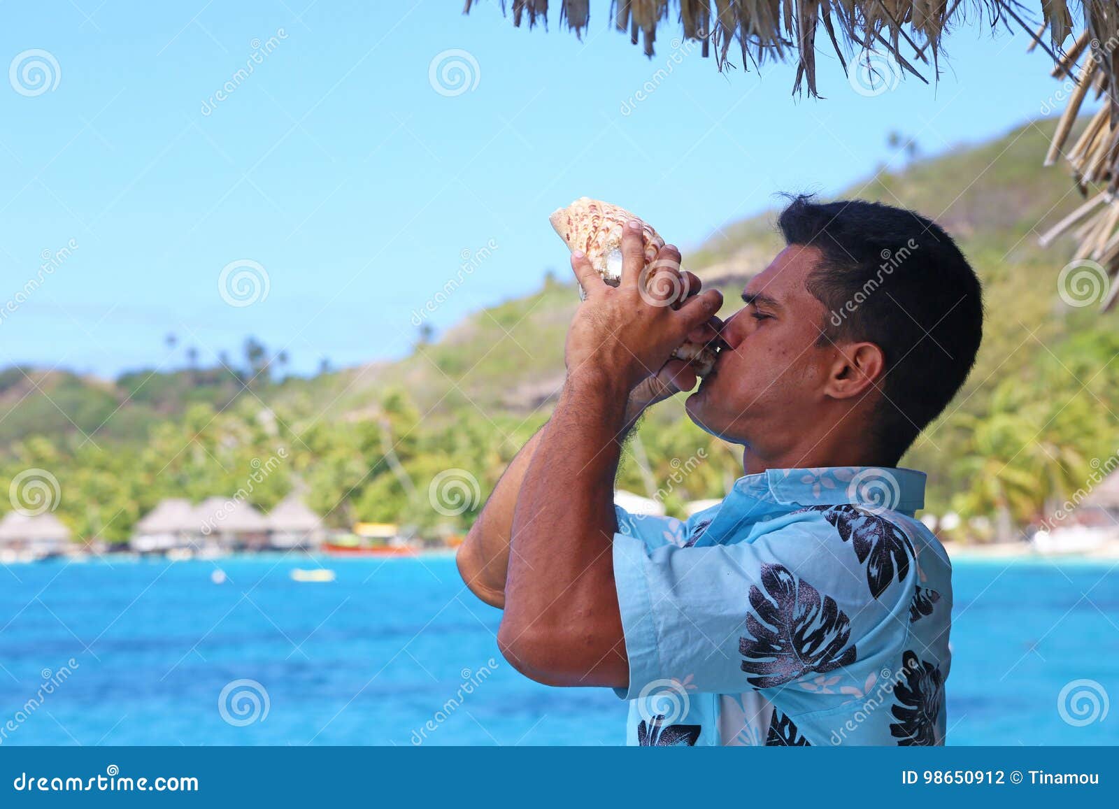 Man Blowing A Conch Shell On Occasion Of Ganesh Chaturthi. Man Blow ...