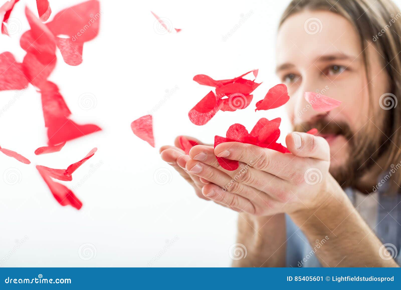 Man blowing paper hearts stock image. Image of valentine - 85405601
