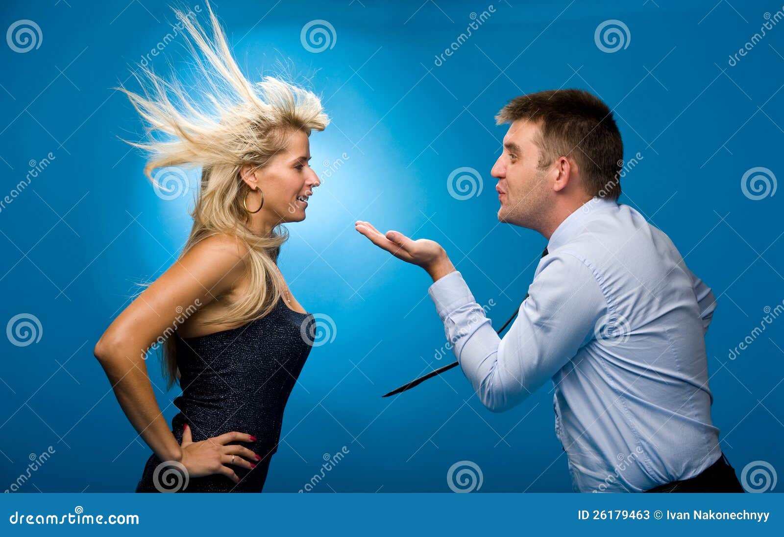 Man blows on the woman stock image. Image of leisure - 26179463