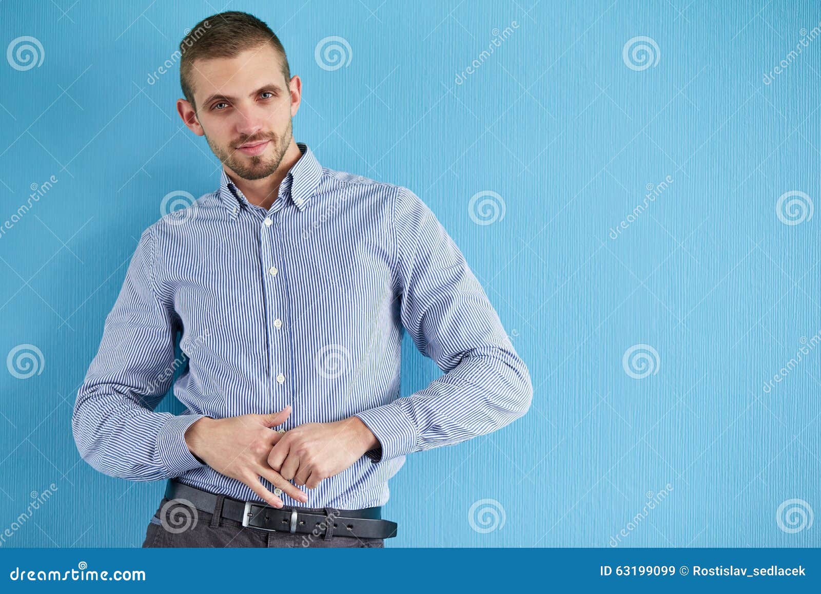 Man on blue background stock image. Image of confident - 63199099