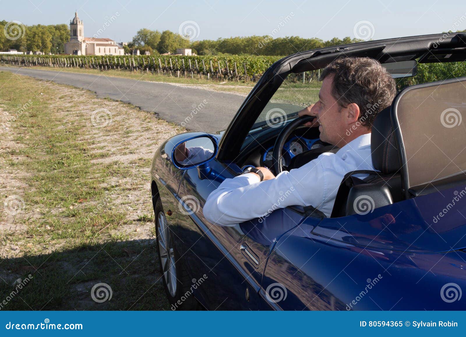 Man in a Blue Convertible Car Smiling Stock Image - Image of person ...