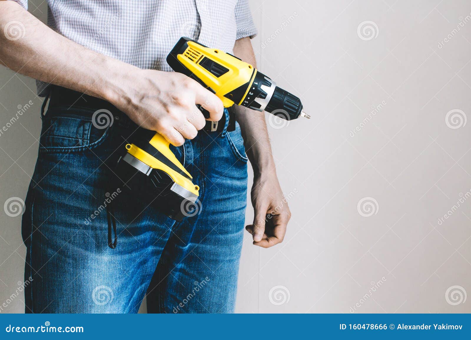 Man with a Drill in His Hand Stock Photo - Image of craft, foreman ...