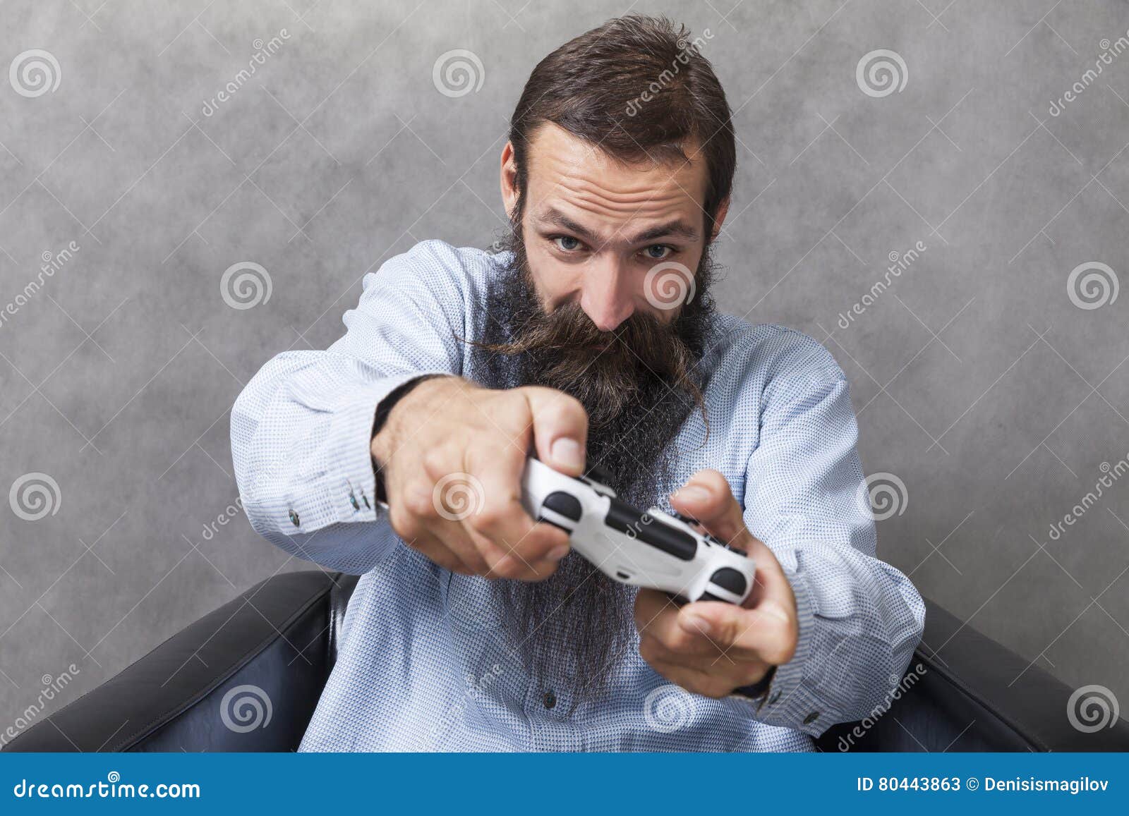 Man in Blue Shirt with Video Game Controller Stock Image - Image of ...