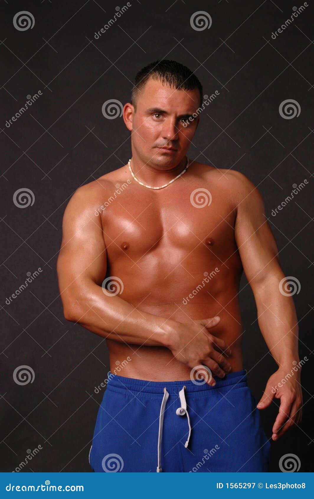 Man in blue sweats stock image. Image of short, face, sweats - 1565297
