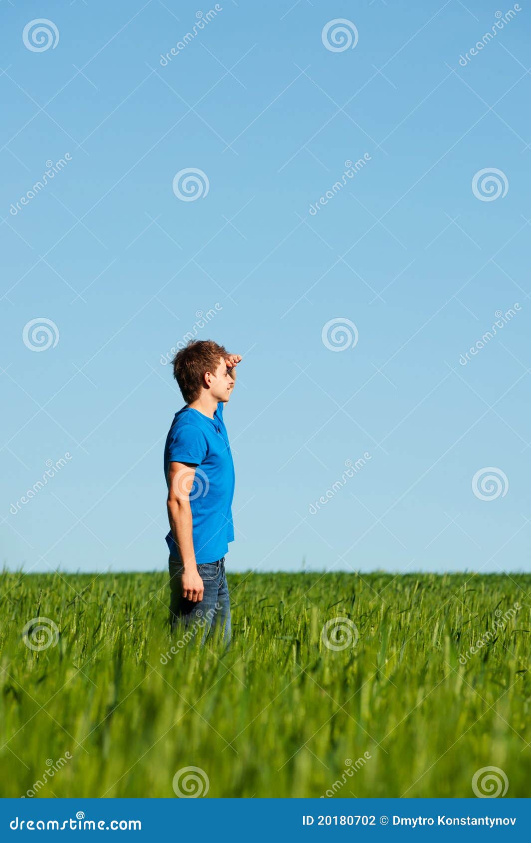 Man in Blue T-shirt is Scrutinizing Stock Photo - Image of handsome ...