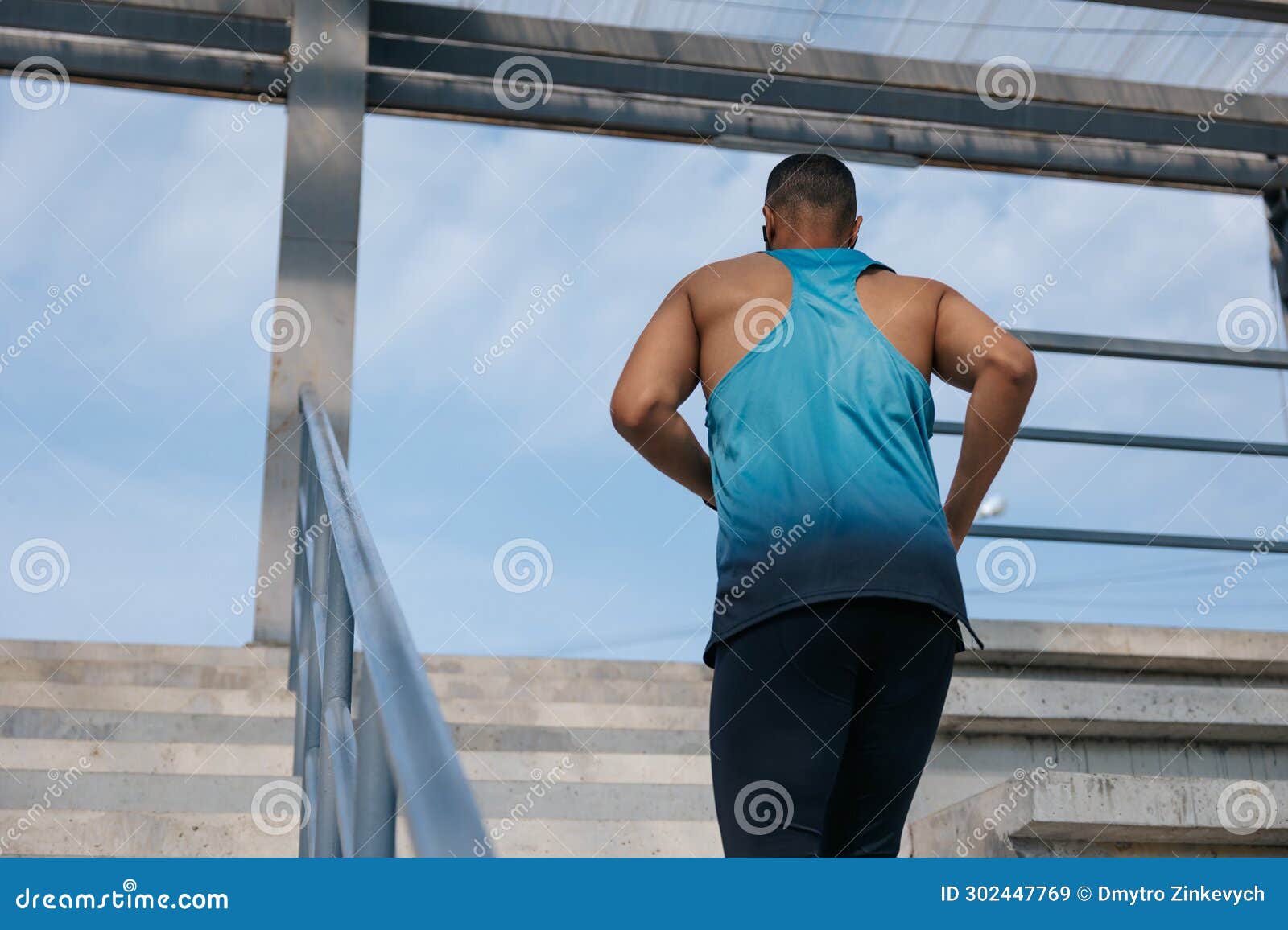 Man in Blue Tshirt Running and Looking Concentrated Stock Image - Image ...