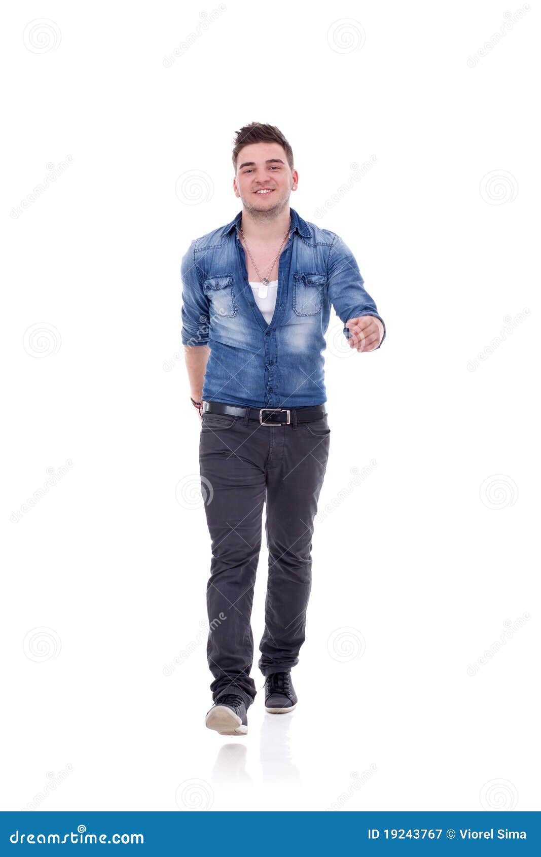 Man in blue walking stock image. Image of forward, shot - 19243767