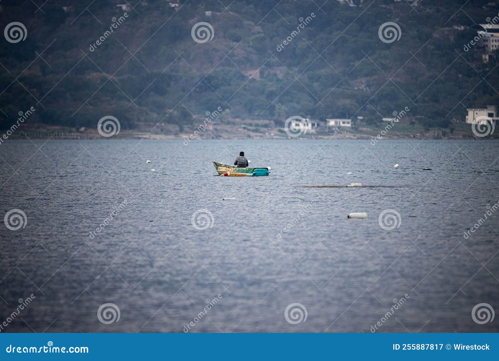 Man on a Boat Floats on the Surface of the Water. Stock Image - Image ...