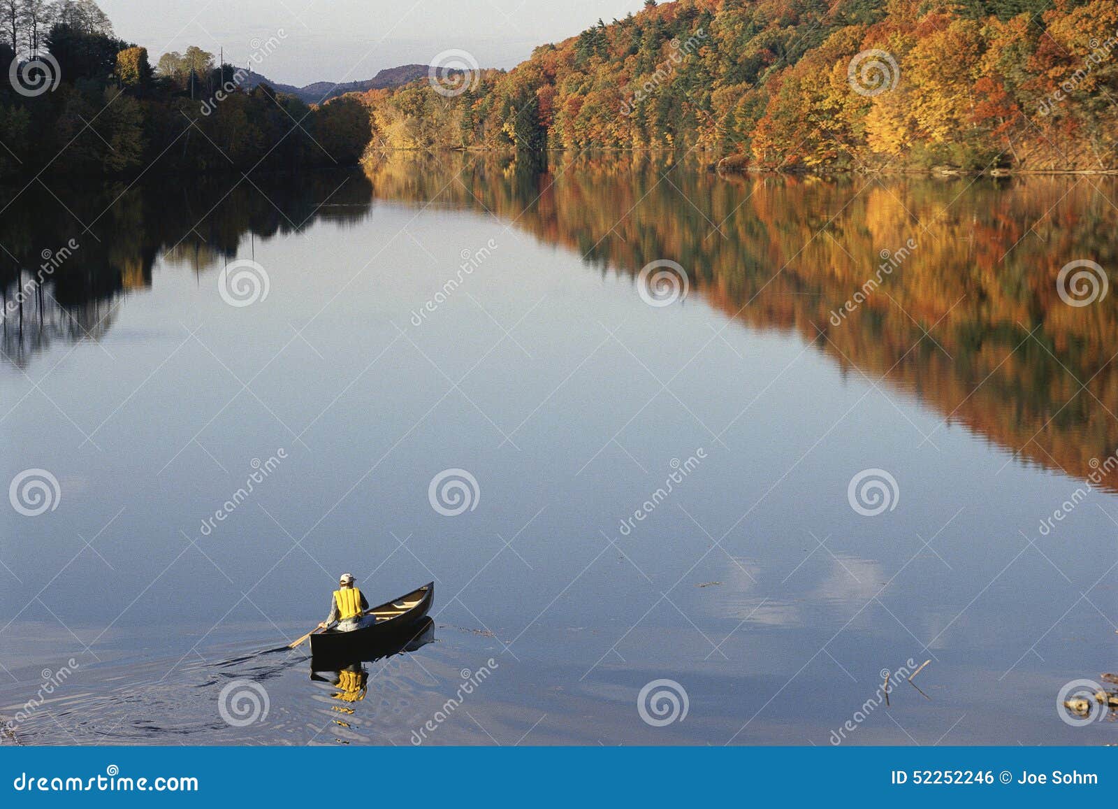 Man in boat on stream stock photo. Image of tree, leisure - 52252246