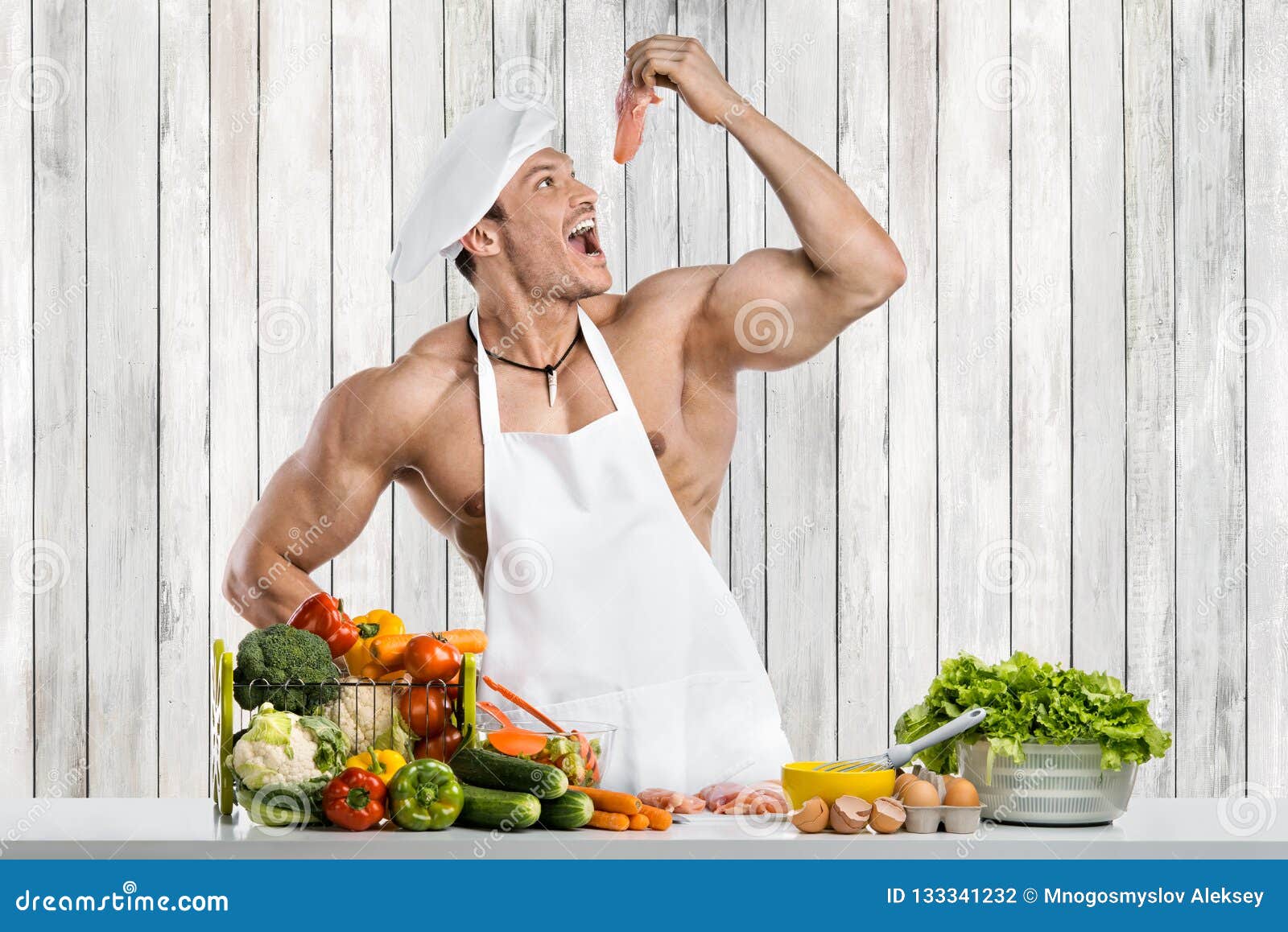Man bodybuilder on kitchen stock photo. Image of fitness - 133341232