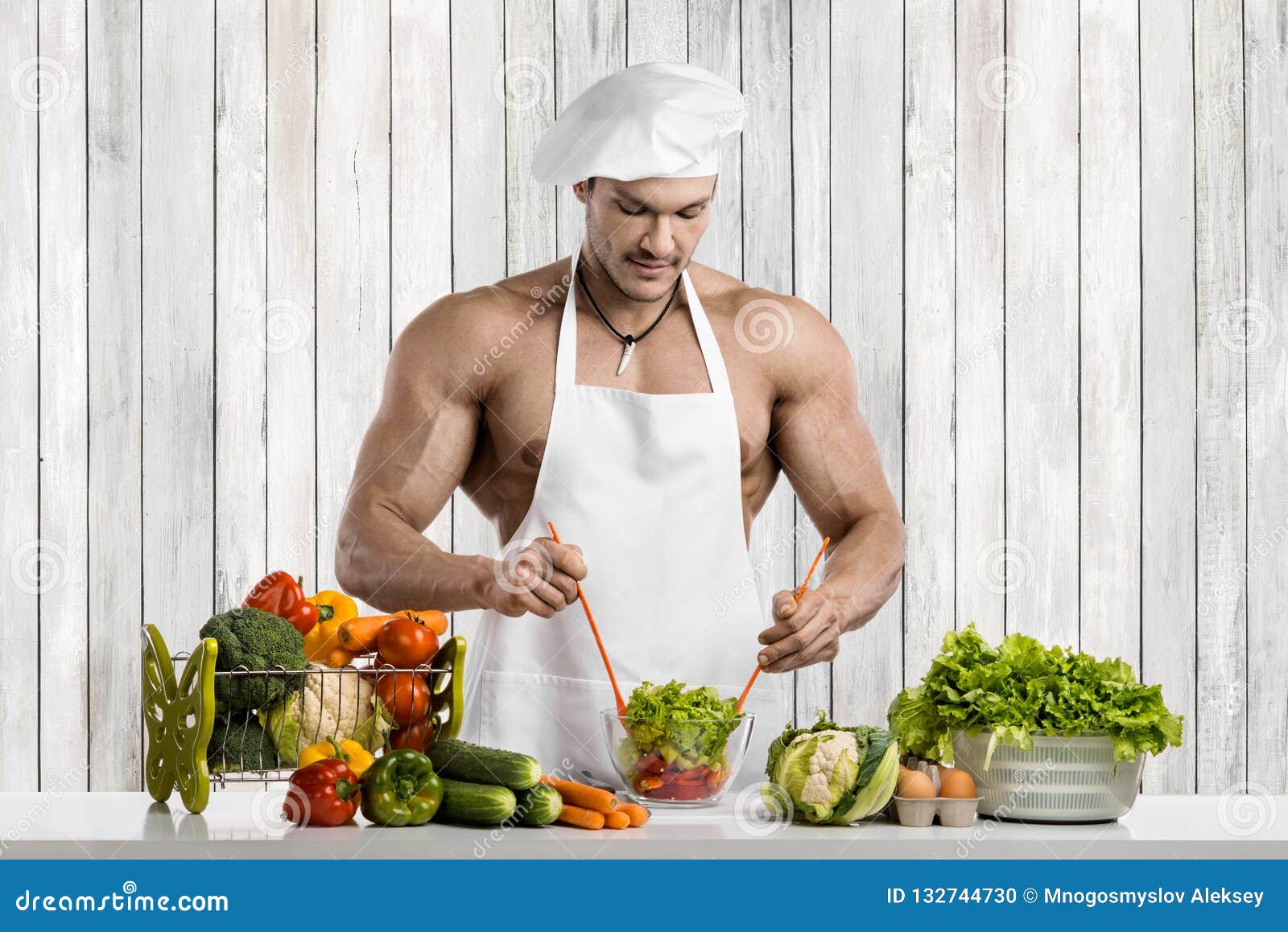 Man bodybuilder on kitchen stock photo. Image of athletics - 132744730