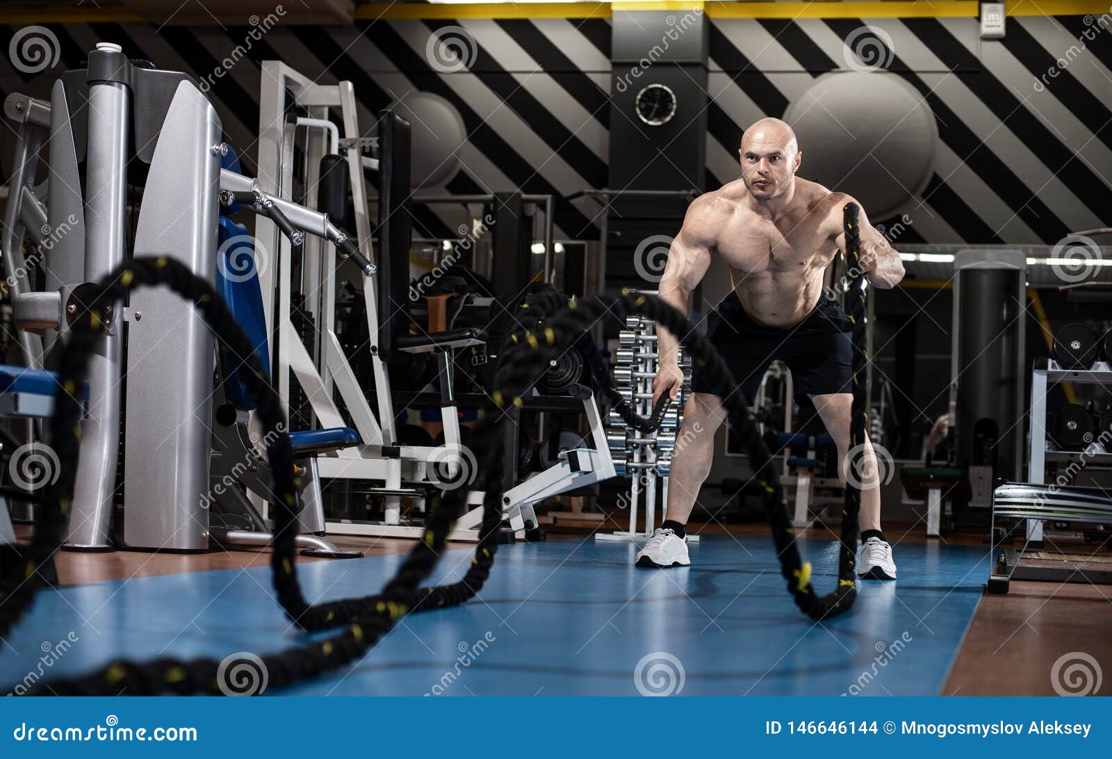 Man Bodybuilder Perform Exercise Stock Photo - Image of hand, performs ...