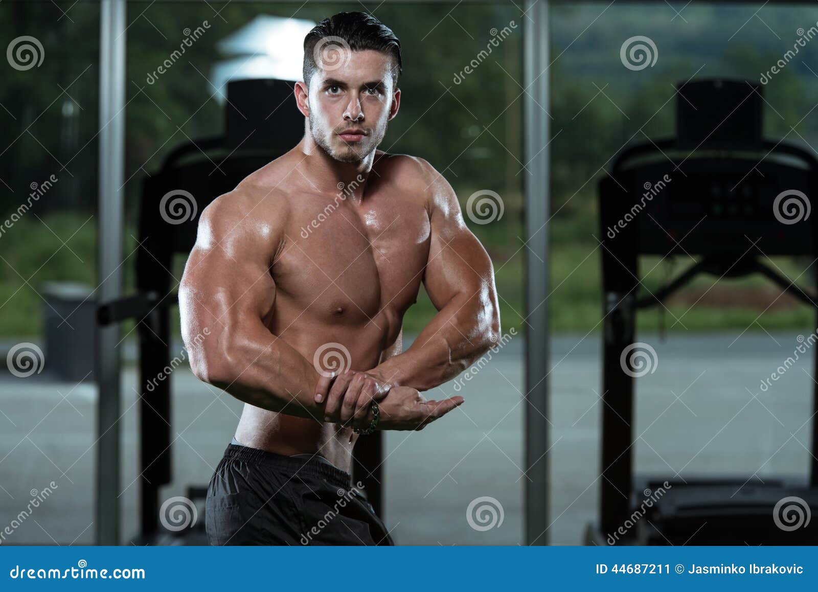 Man Bodybuilder Performing Side Chest Pose Stock Image - Image of build ...