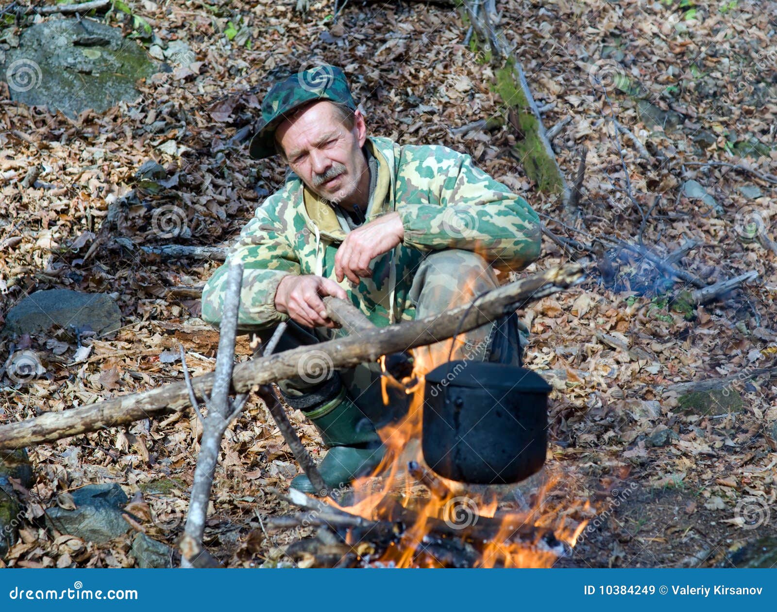 Man at Bonfire 4 stock image. Image of fire, burning - 10384249