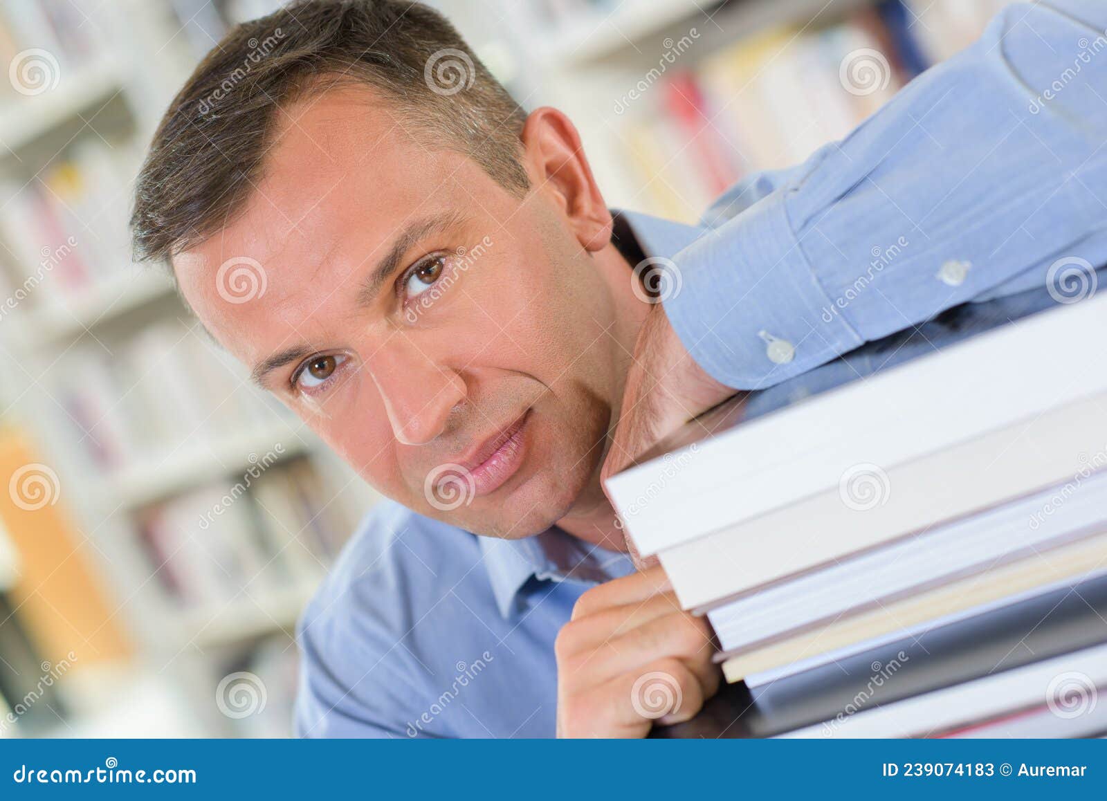 Man with books stock image. Image of educational, publication - 239074183