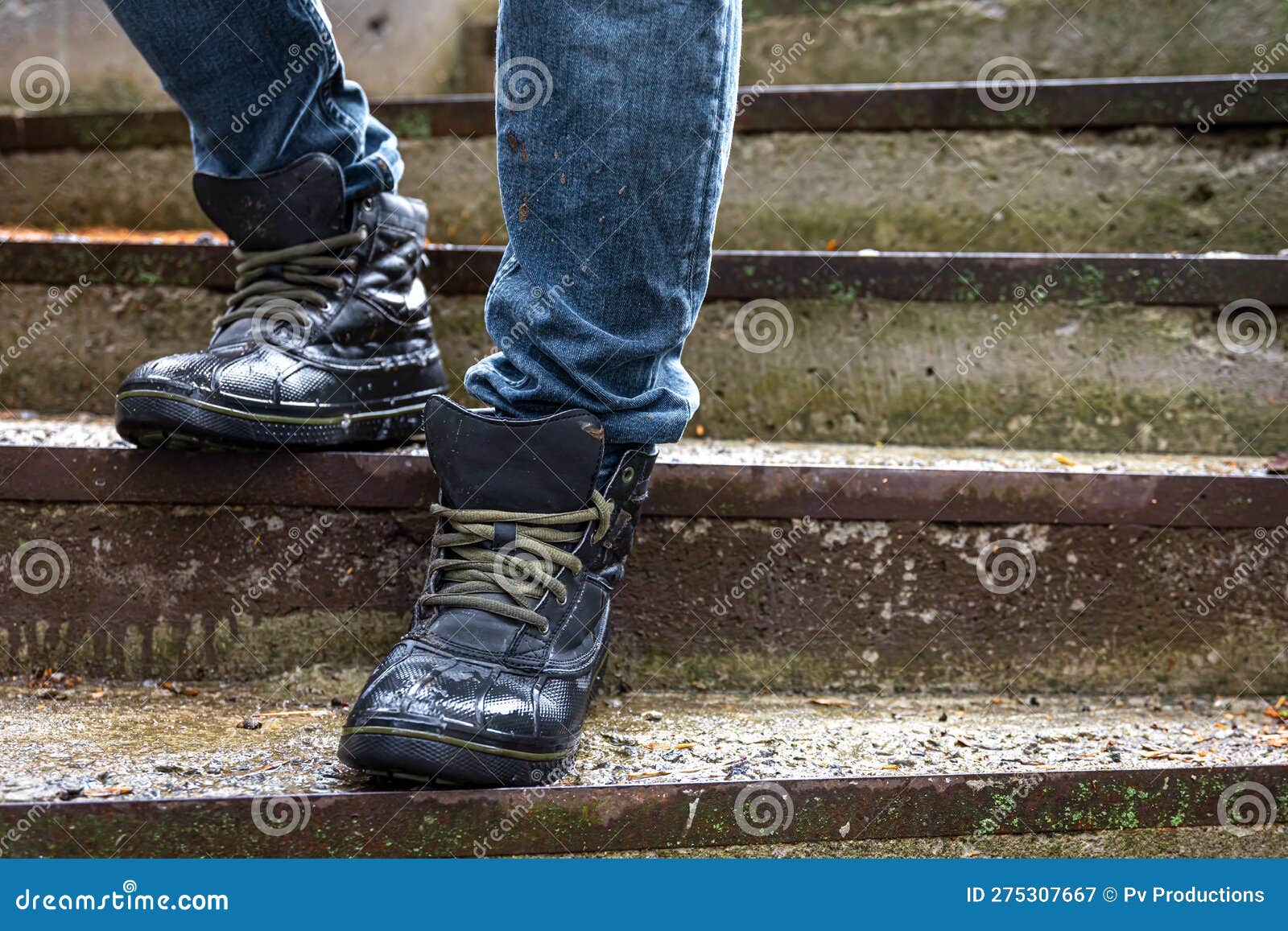A Man in Boots on the Old Steps, Close-up. Stock Image - Image of ...