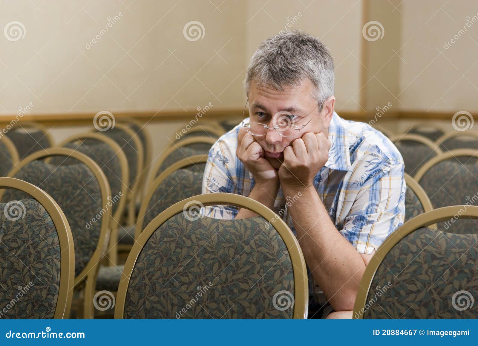 Man at a boring conference stock image. Image of empty - 20884667