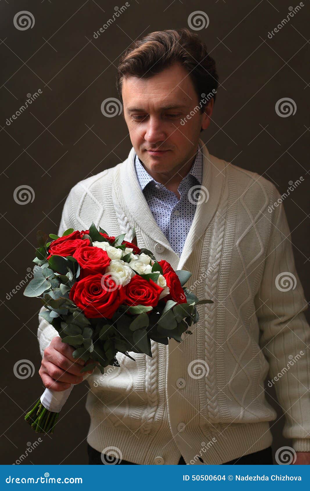 A Man with a Bouquet of Roses Stock Photo - Image of gentleman, flowers ...