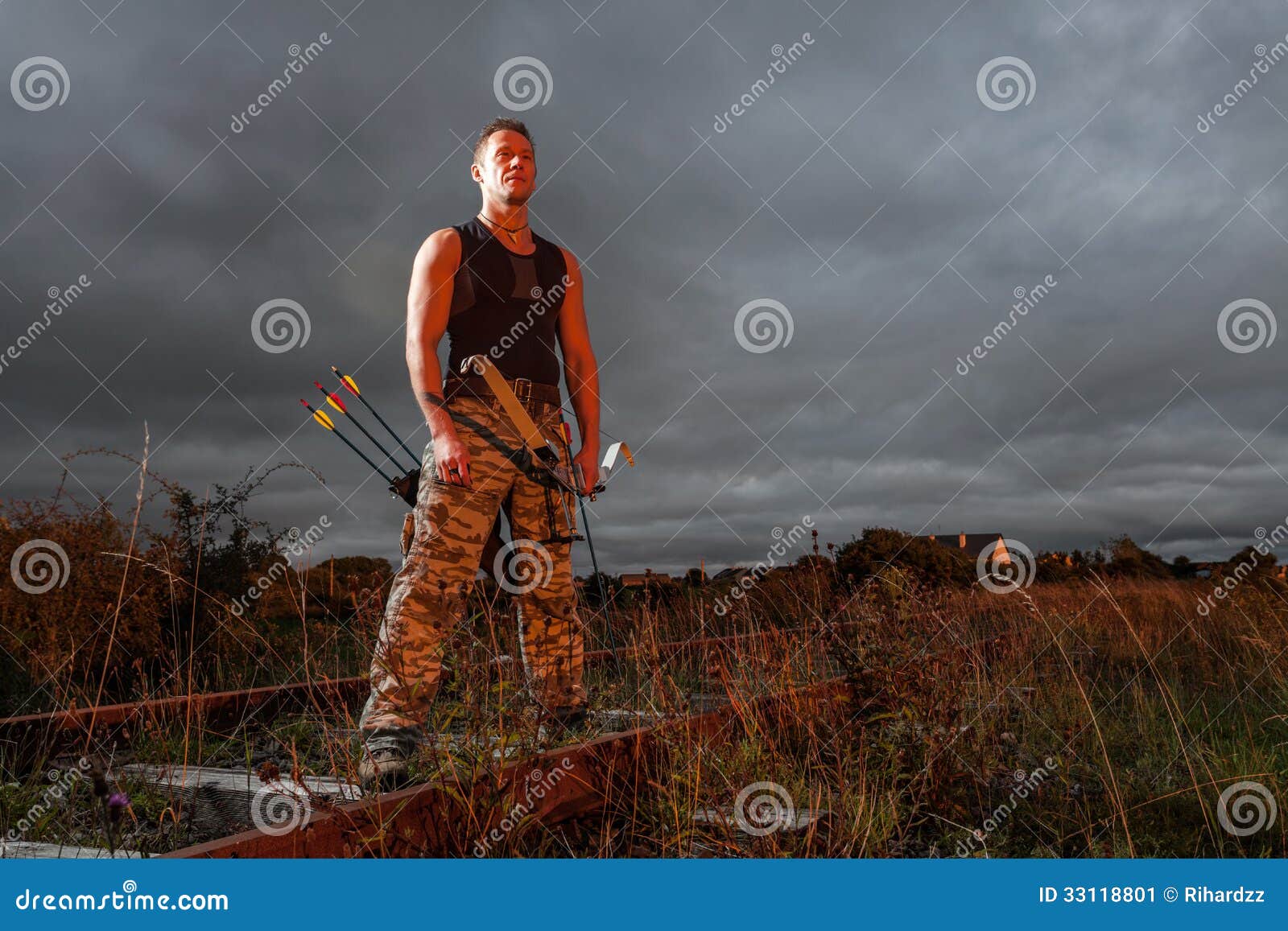 Man with bow and arrows stock image. Image of aggression - 33118801