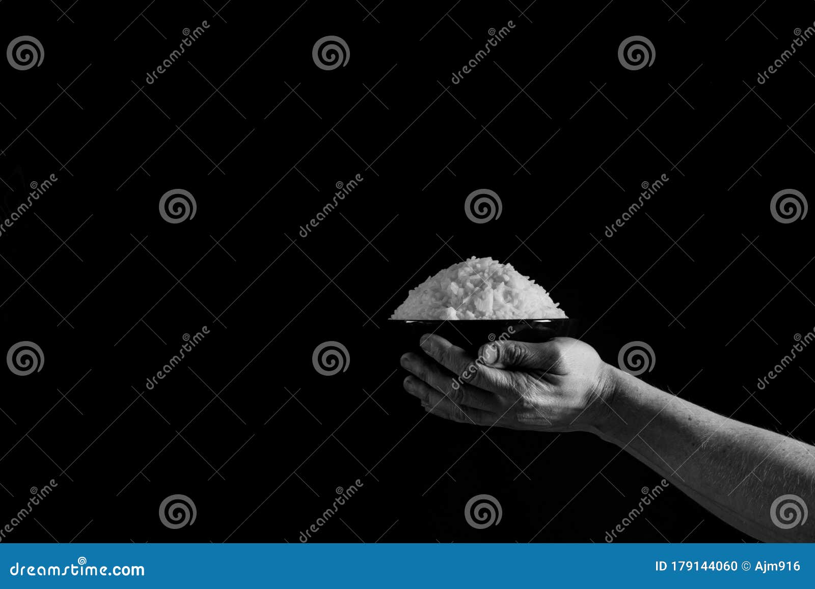 Man with Bowl of Rice in Hand. Helping Hands Concept, Copy Space Stock ...